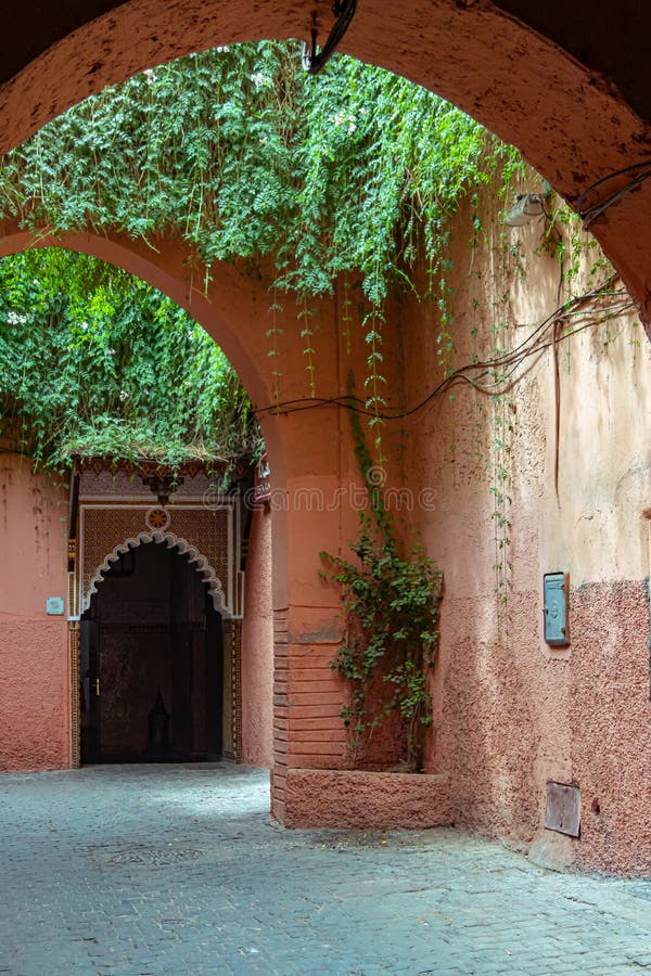 Morocco. Street with People in Marrakech with Mosque Koutoubia Mosque ...