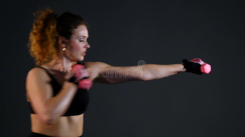 Beautiful Strong Woman Exercises with Dumbbells Stock Video - Video of ...