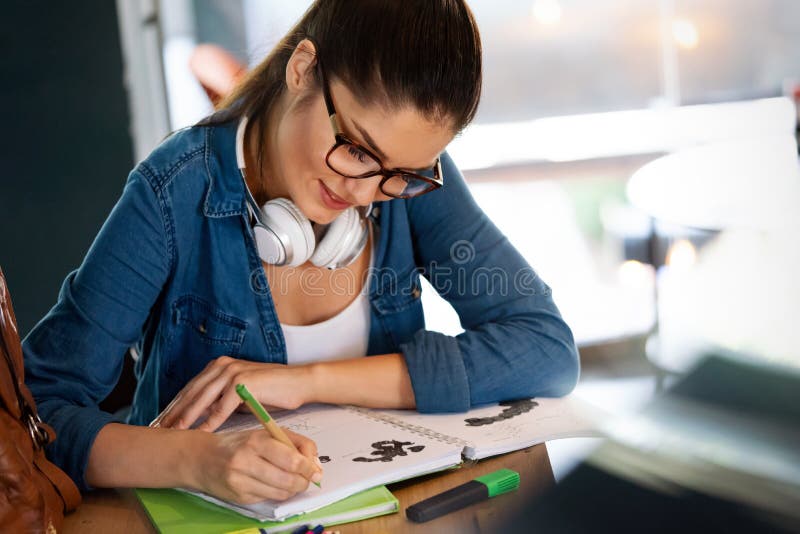 Beautiful Student Girl Studying, Reading Book at Home Stock Photo ...