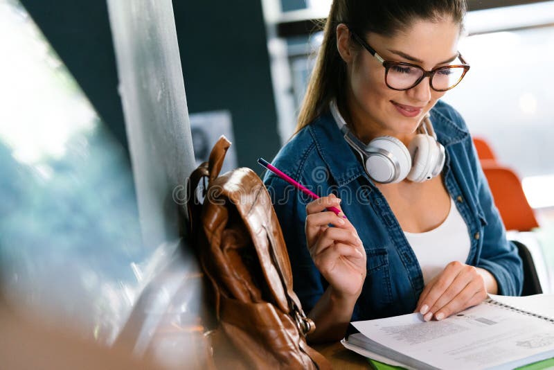 Beautiful Student Girl Studying, Reading Book at Home Stock Photo ...