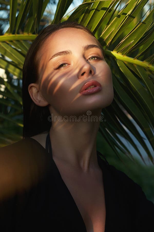 Beautiful Passion Girl In Palm Leaves Young Woman With Make Up Under
