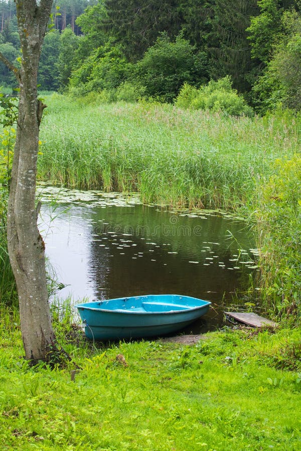 Beautiful Summer Landscape. Boat on the Lake Shore Stock Photo - Image ...