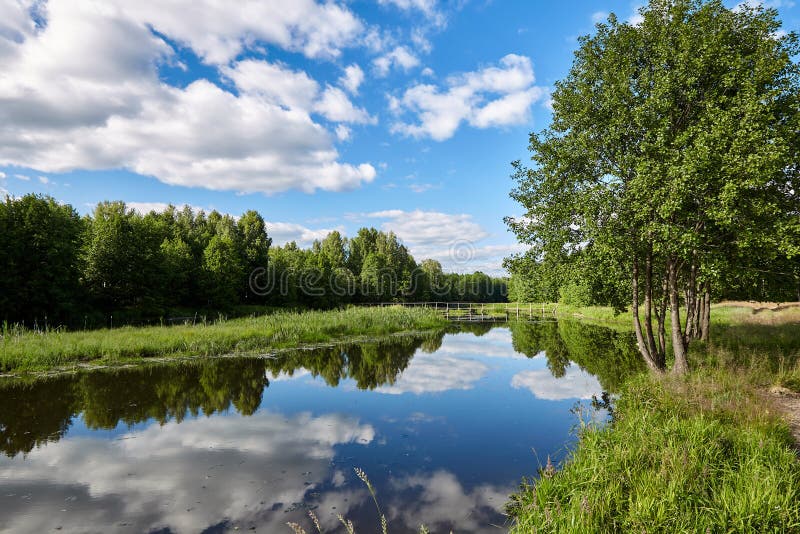 Beautiful Summer River at Sunny Day with Clouds Reflection in the Water ...