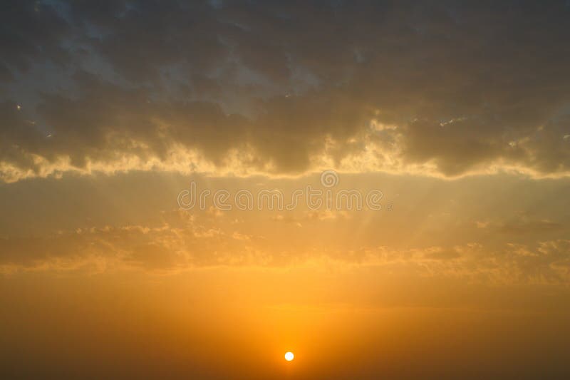 Beautiful Summer Sunset in Orange and Yellow Tones. Sun Under Rows of ...
