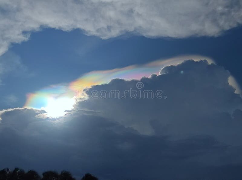Beautiful Sun and Clouds and Rainbow Rays of the Sun. Stock Photo ...