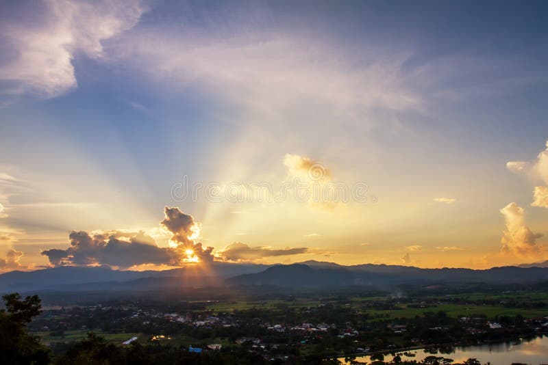 Beautiful of Sun Light is Falling Behind the Mountain Background. Stock ...