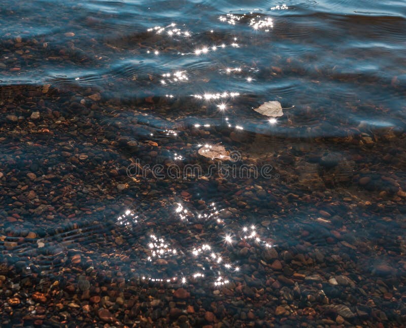 Beautiful Sun Rays are Reflected in the Water. Stock Photo - Image of ...