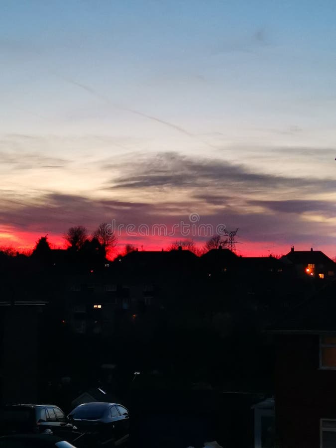 Beautiful Sun Set Above Houses Stock Photo - Image of beautiful, houses ...