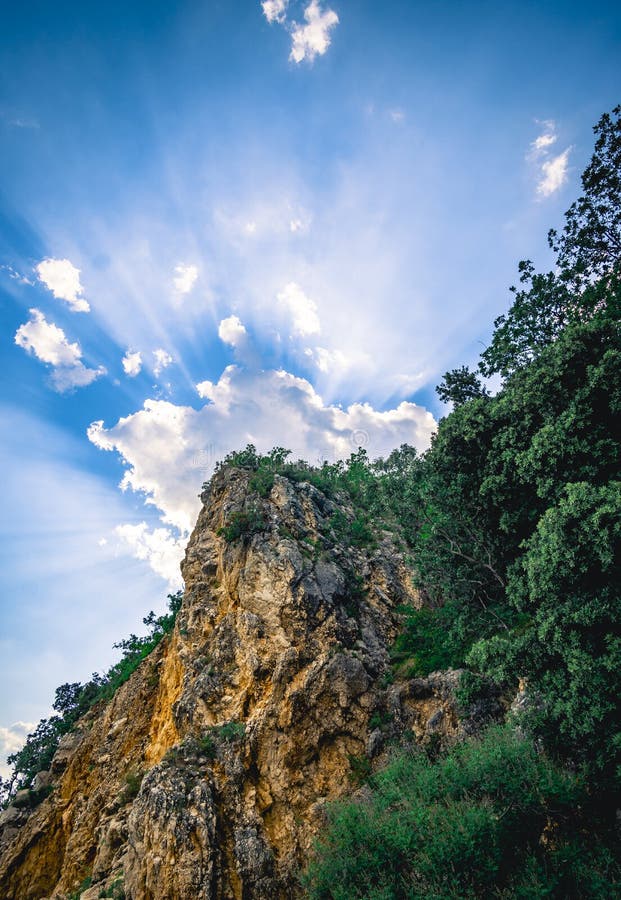 Beautiful Sunbeams Behind a Cloud Stock Photo - Image of colors ...