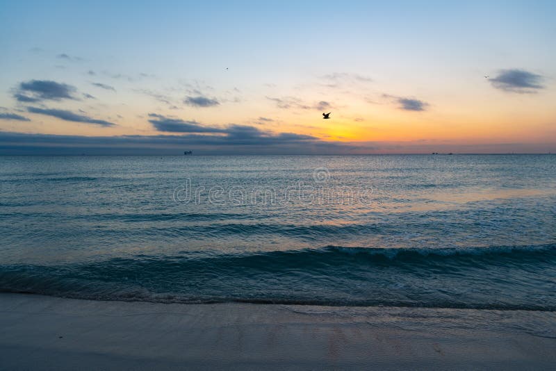 Beautiful Sundown with Ocean Water on the Summer Beach Stock Image ...