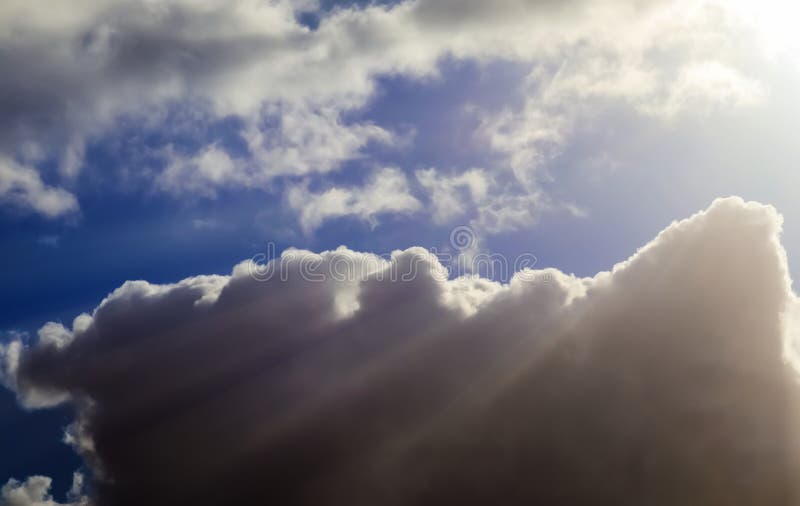 Beautiful Sunlight Beams through a Stunning Cloudscape in the Sky Stock ...