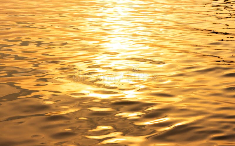 Beautiful Sunlight Reflection of Gold Water. Surface? Gold? Water ...