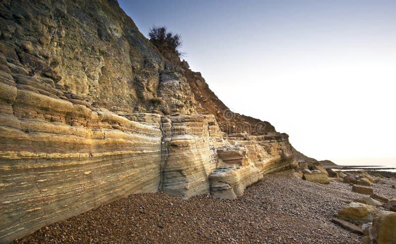 Beautiful Sunrise Along Striated Layered Cliffs Stock Photo - Image of ...