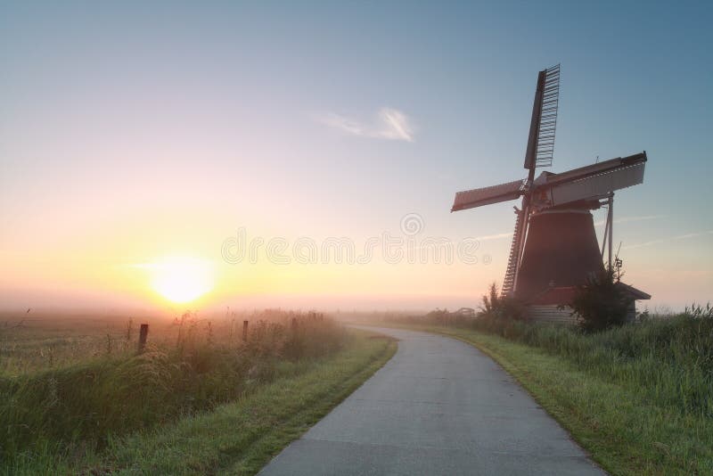 Beautiful Sunrise Behind Windmill Stock Image - Image of rural, green ...