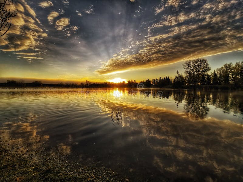Beautiful Sunrise at the Lake Stock Image - Image of reflection, clouds ...