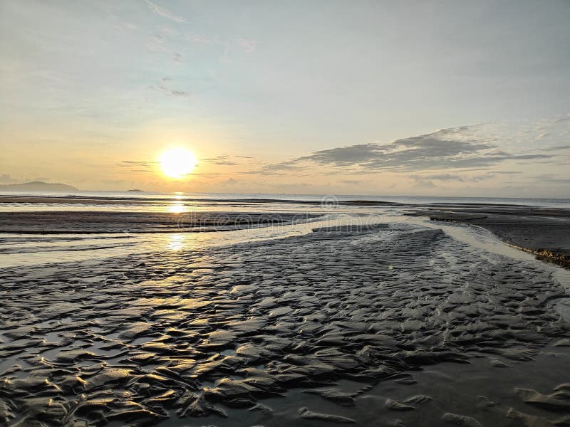 Beautiful Sunrise on a Muddy Beach. Stock Photo - Image of horizon ...