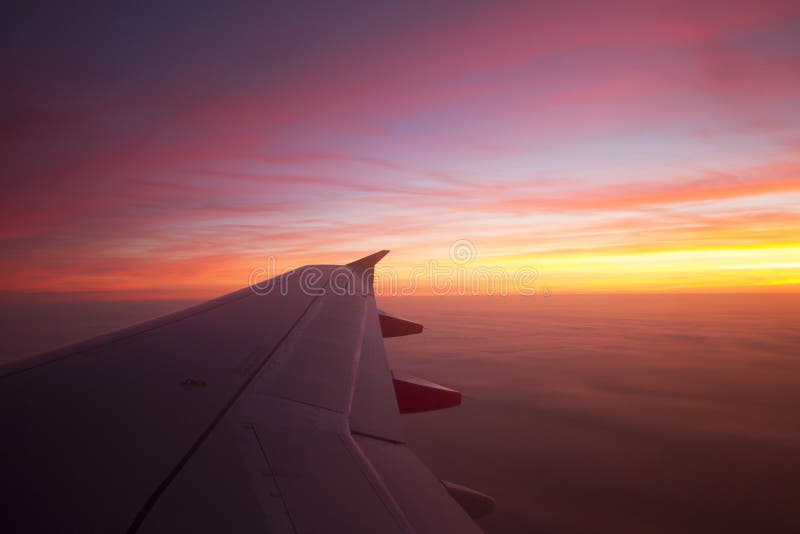 Beautiful Sunrise Out of Plane Window Stock Photo - Image of purple ...