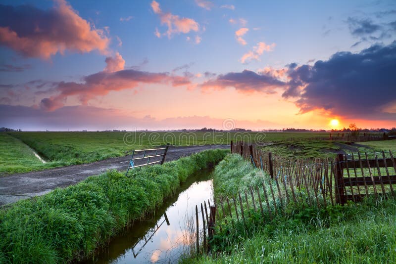 Beautiful Sunrise Over Farmland Stock Photo - Image of orange, outdoors ...