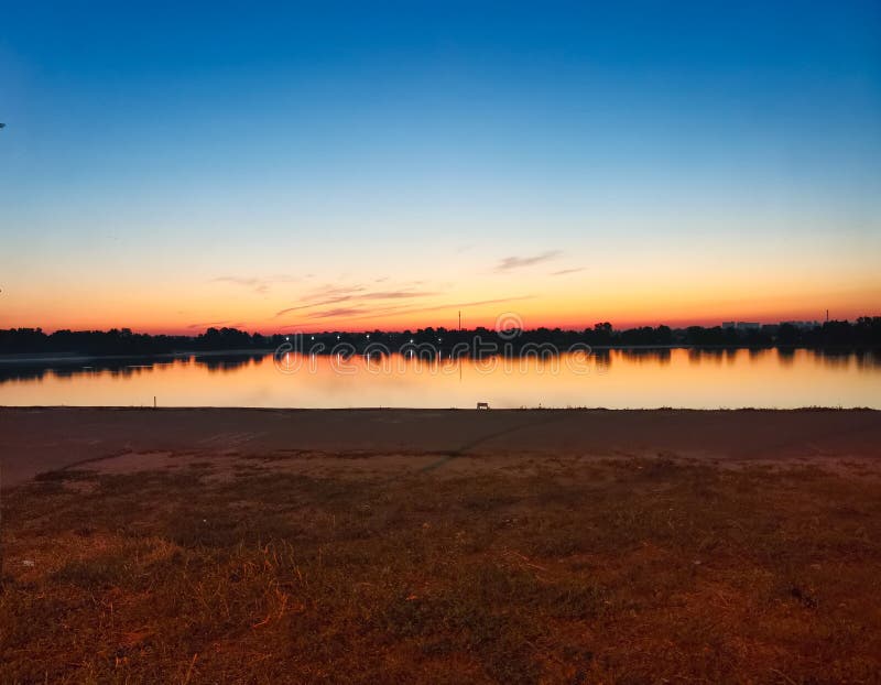 Beautiful Sunrise by the Water in the Early Morning Stock Photo - Image ...