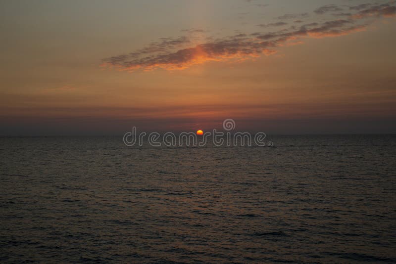 Beautiful Sunset Above the Sea the Setting Sun Over the Ocean, the Sun ...