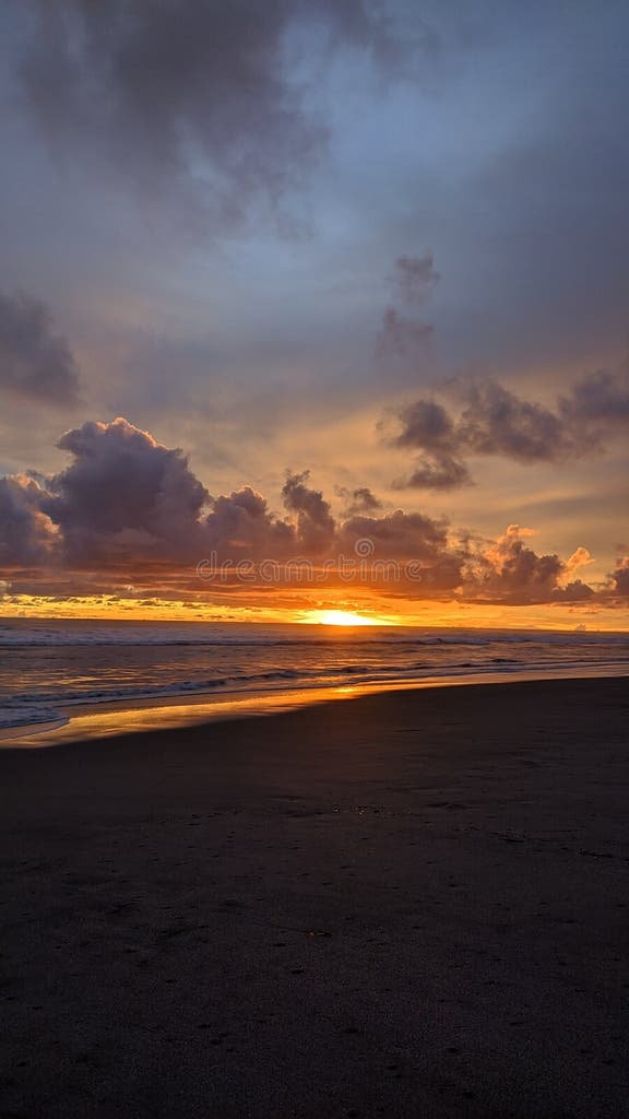 Beautiful Sunset Amidst the Silence of the Beach Stock Photo - Image of ...
