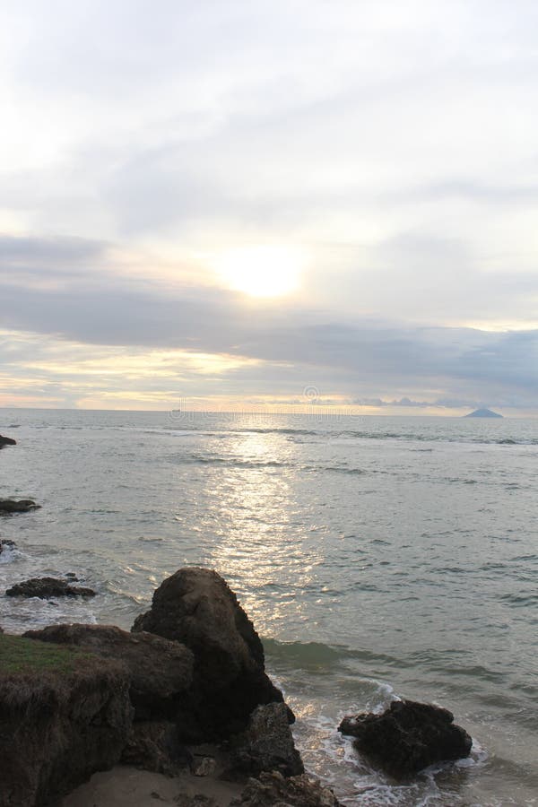 Beautiful Sunset on Anyer Beach Stock Photo - Image of rock, horizon ...