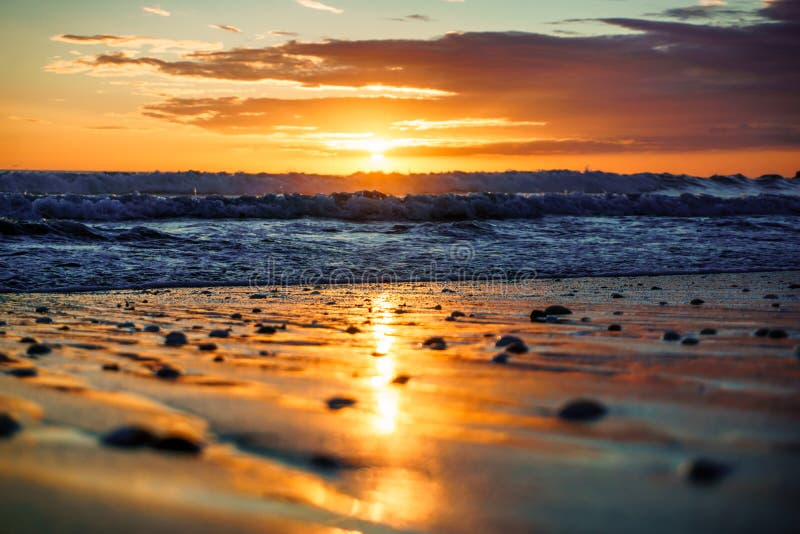 Romantic Sunset on an Empty Beach Stock Photo - Image of front, reddish ...