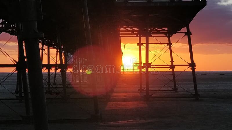 Beautiful Sunset at a Beach with the Sun Rays Glimpsing through the ...