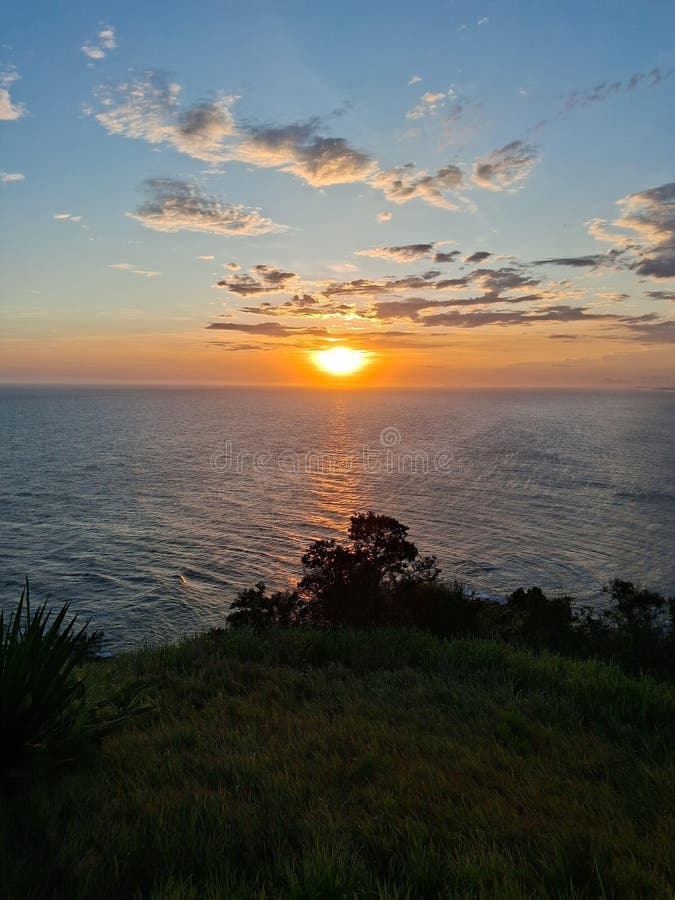 Beautiful Sunset Behind the Sea Coloring the Sky with Different Shades ...