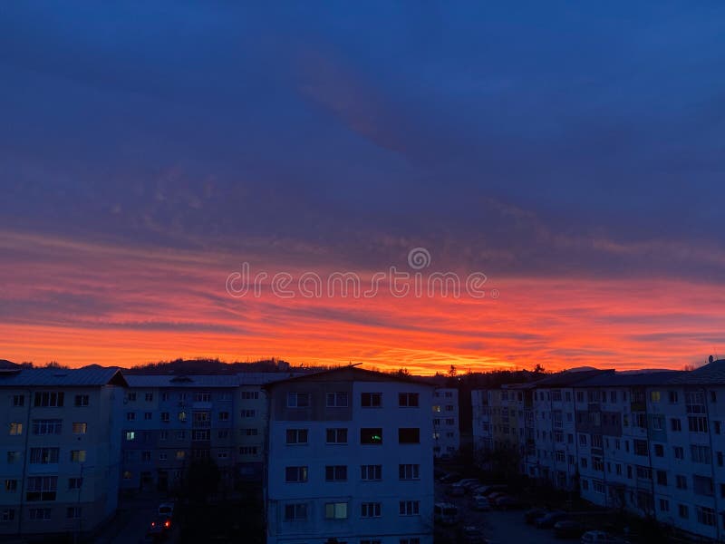 Sunset over neighborhood stock photo. Image of sunset - 214209870