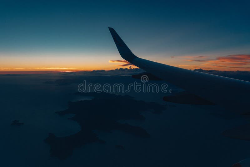 Beautiful Sunset Captured from the Inside of a Plane and the Wing ...
