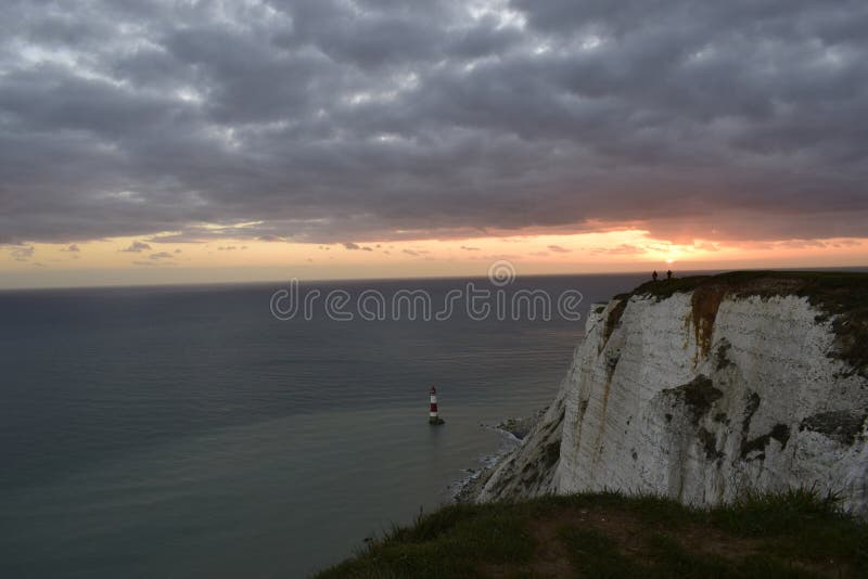 Sunset from the Age of a Cliffs Stock Image - Image of lighthouse ...