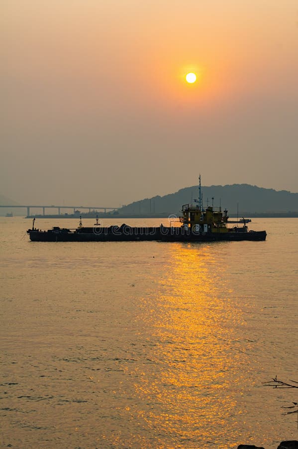 Beautiful Sunset and a Engineering Ship Stock Image - Image of work ...