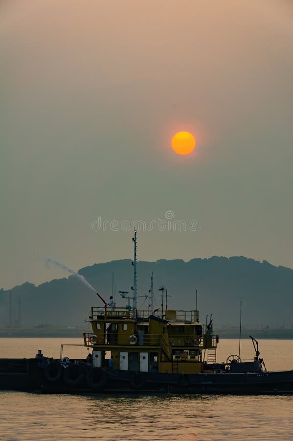 Beautiful Sunset and a Engineering Ship Stock Photo - Image of urban ...