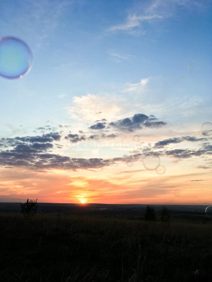 Beautiful Sunset Evening Sky with a Setting Sun Stock Image - Image of ...