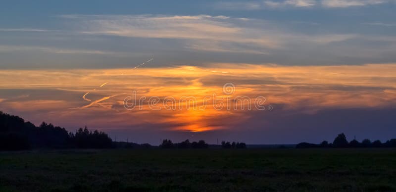 Beautiful Sunset in the Field. Red, Yellow, Blue Sky. Summer Evening ...