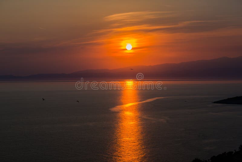 Beautiful sunset in Greece stock image. Image of island - 109854873