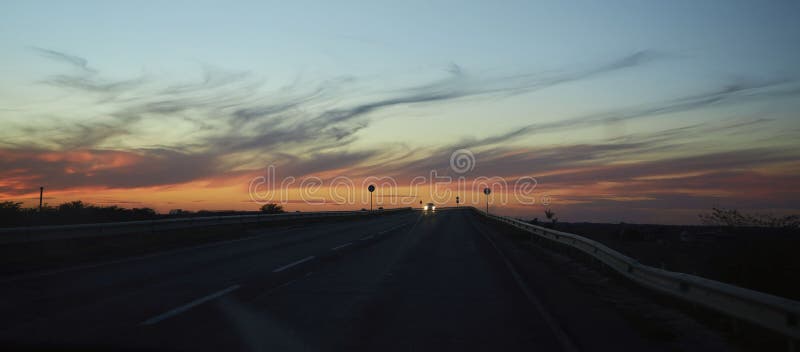 Beautiful Sunset on the Highway between the Cities. Landscape with ...
