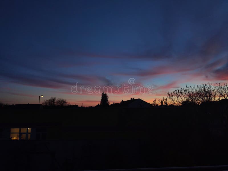 A Beautiful Sunset with Houses Stock Image - Image of backyard, dusk ...