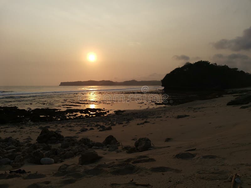 Beautiful Sunset in Indonesian Beach Stock Photo - Image of reflection ...