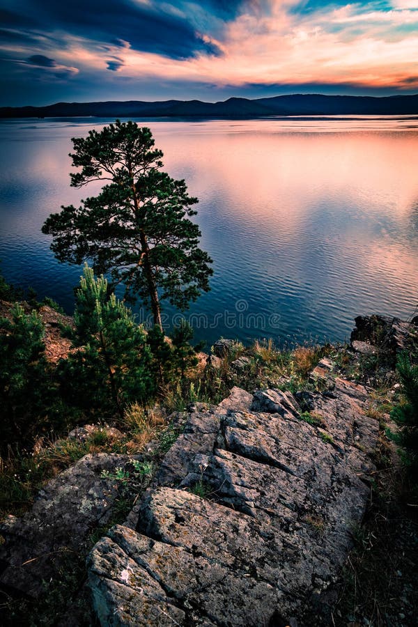 Beautiful Sunset Landscape on Mountain Lake with Rocks and Pine Stock ...