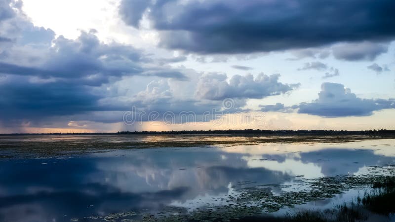 Beautiful Sunset Landscape with Reflection on River Sky and Clouds ...