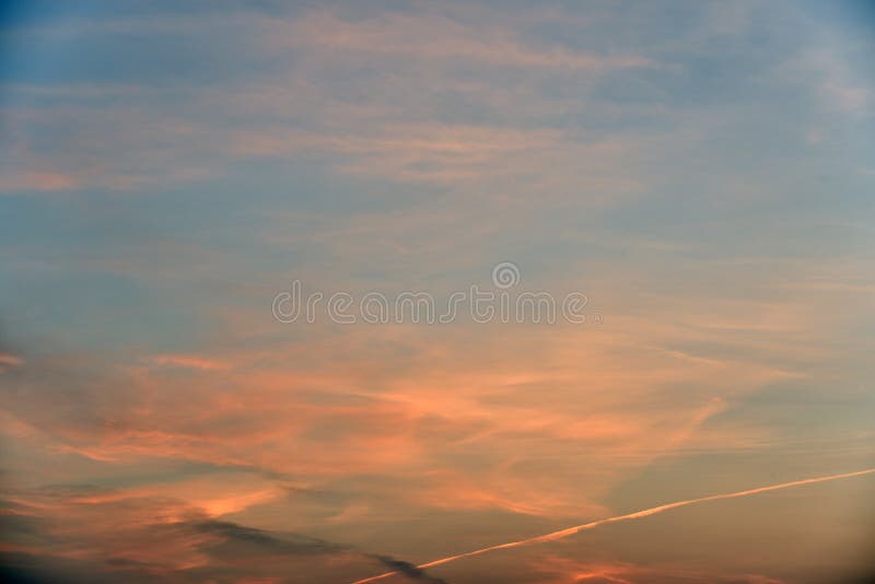 Beautiful Sunset Light and Clouds and a Trace of the Plane. Evening ...