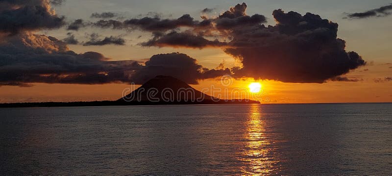 Beautiful Sunset on Manado Tua Island Stock Photo - Image of evening ...