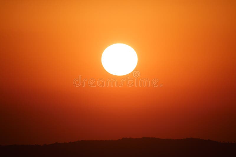 Beautiful Sunset with Orange Sky and Complete Sun Stock Image - Image ...