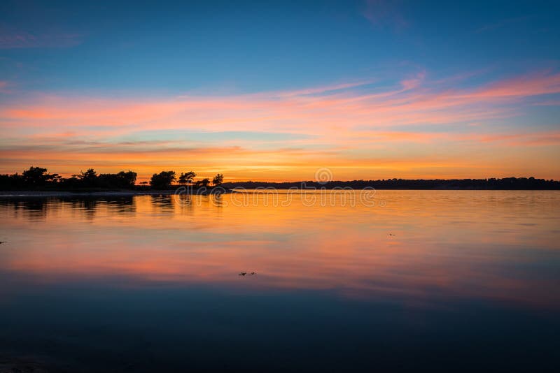 Beautiful Sunset Over Bay with Reflections Stock Photo - Image of ...