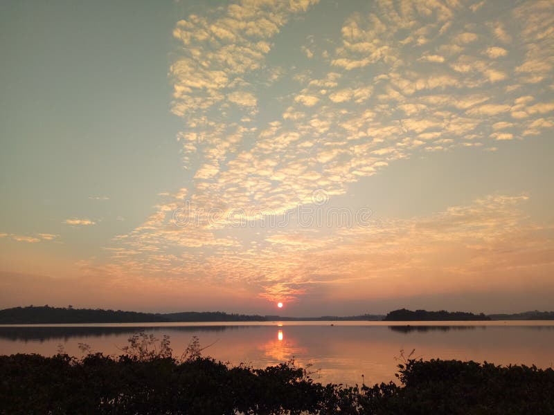Beautiful Sunset Sky with Colourful Altocumulus Clouds with Reflexion ...
