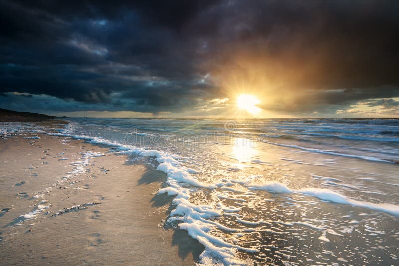 Beautiful Sunset Over North Sea at Storm Stock Image - Image of people ...