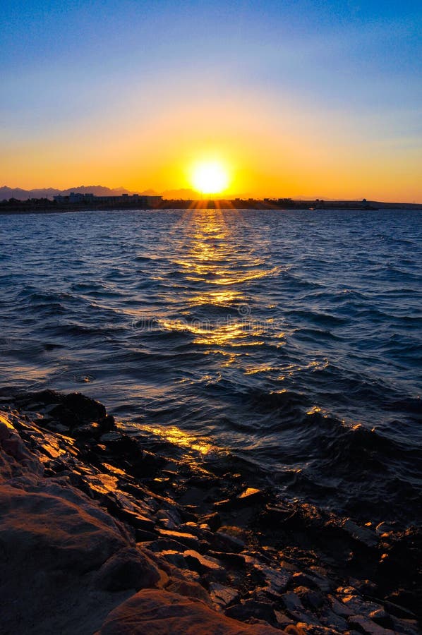 Beautiful sunset over sea stock image. Image of gold - 36783977