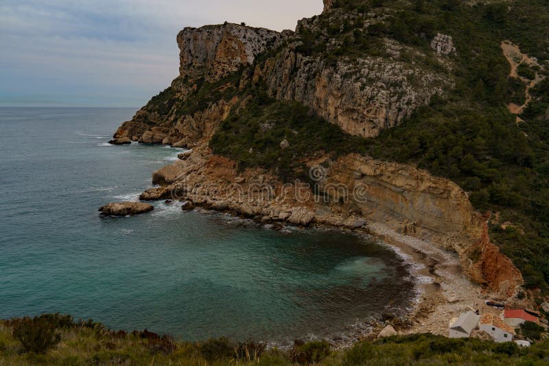 Beautiful Sunset Over the Sea Overlooking Rocky Beaches and Steep Rocky ...